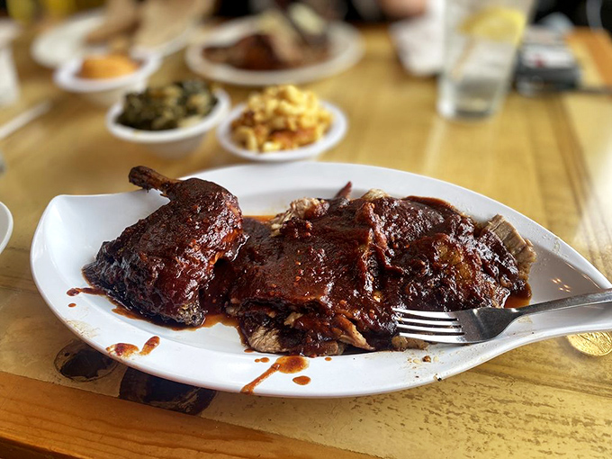 Ribs so tender they practically surrender at the sight of your fork. The kind of barbecue that makes vegetarians question their life choices.