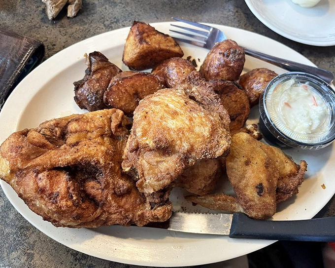 Broasted chicken that would make your grandmother jealous. Golden, crispy exterior giving way to juicy meat&mdash;this is what comfort food dreams are made of.