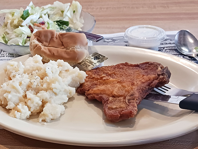 When mashed potatoes, gravy, and pork chop share a plate, it's not just dinner &ndash; it's therapy without the hourly rate.
