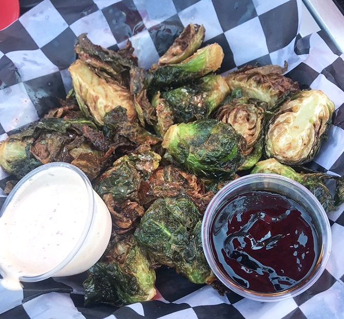 Brussels sprouts so good they'll make you question your childhood vegetable trauma. Crispy, savory, and served with dipping sauces that seal the deal.