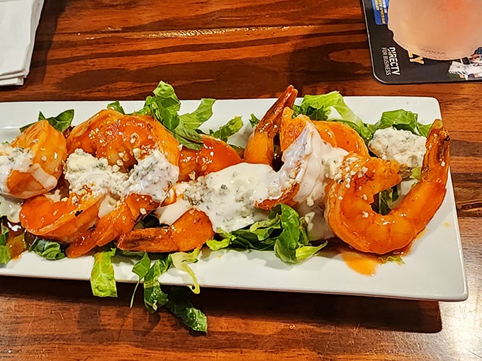 These buffalo shrimp bring the heat but keep their seafood dignity&mdash;crisp, saucy, and arranged like a spicy work of art.