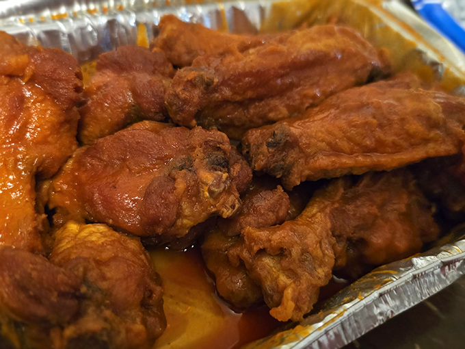 Wings that don't play second fiddle to the pizza. These crispy, sauce-slathered beauties deserve their own fan club and commemorative t-shirt.