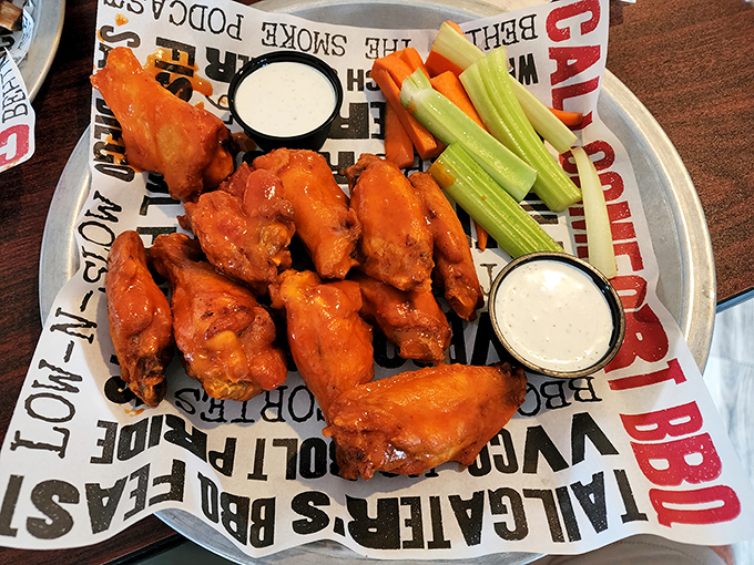 Wings that make you question why we ever invented forks. The celery sticks are just there to make you feel virtuous between bites.