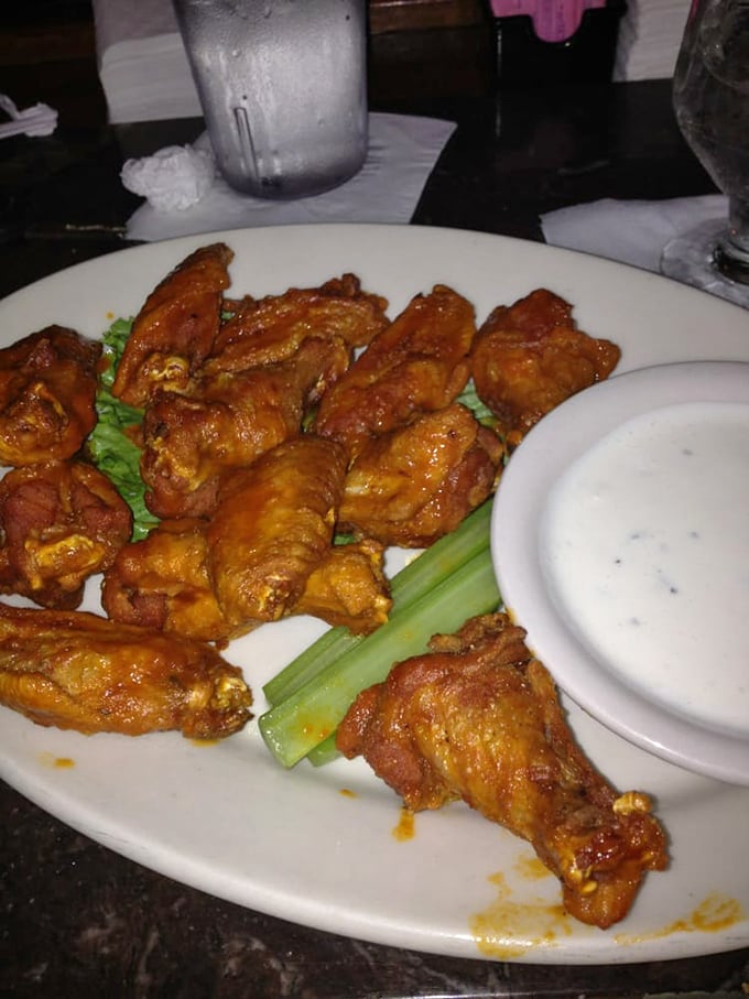 Buffalo wings that prove Half Shell isn't just a one-trick pony—these crispy, sauce-slathered beauties would make even Memphis barbecue joints nod in respect.