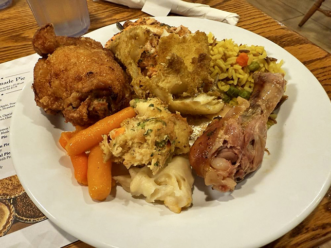 The buffet plate of champions: a mountain of comfort where every forkful tells a story of Amish cooking traditions and butter-based happiness.
