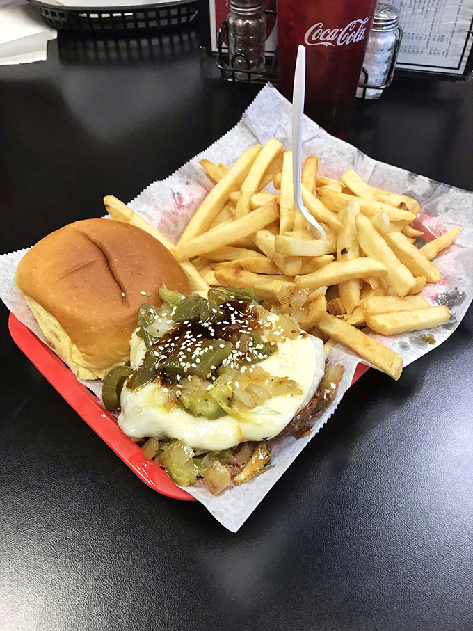 A cheesesteak burger that bridges two worlds of deliciousness. Those fries aren't sidekicks—they're co-stars in this lunch production.