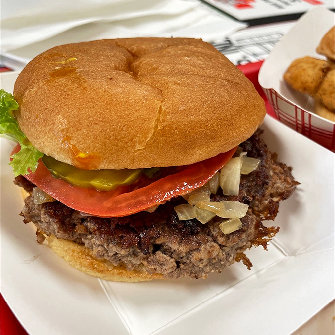 A burger so honest and unpretentious, it could run for office. The melted cheese and fresh toppings create a perfect harmony in every bite.