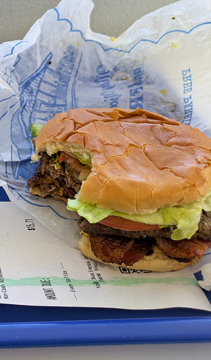 A classic American burger that doesn't need Instagram filters or fancy toppings. That perfectly seasoned patty and toasted bun speak a universal language of satisfaction. 