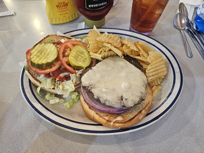 A burger that doesn't need Instagram filters to look this good&mdash;notice how the cheese drapes like a dairy waterfall over honest beef.