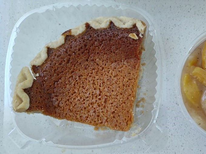 Sweet potato pie that looks like it could make a grown person weep with joy. Grandma would approve of this slice of heaven.