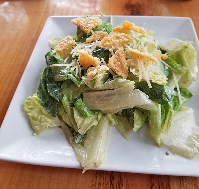 A classic Caesar salad that Julius himself would approve of&mdash;crisp romaine, sharp Parmesan, and crunchy croutons in perfect harmony.