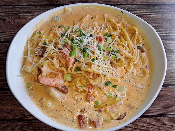 The Cajun Carbonara brings New Orleans to Missouri with plump shrimp and creamy sauce that'll have you contemplating licking the plate when no one's looking.