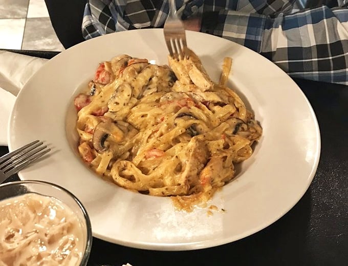 A bowl of Cajun pasta that's having more fun than most people on vacation. Creamy sauce, perfectly cooked pasta, and enough flavor to make you temporarily forget you're in Missouri.