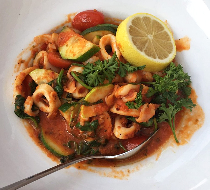 Calamari that's actually tender—not those rubber bands masquerading as seafood that lesser establishments try to pass off as appetizers.