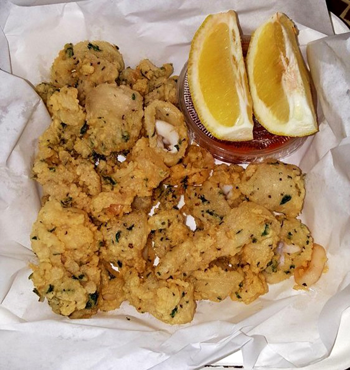 Calamari so perfectly fried it makes you wonder if Neptune himself is back in the kitchen high-fiving the chef.