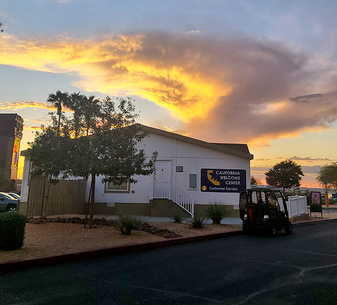 The California Welcome Center greets travelers with the golden hour glow that makes even a modest building look like it's ready for its Instagram moment.
