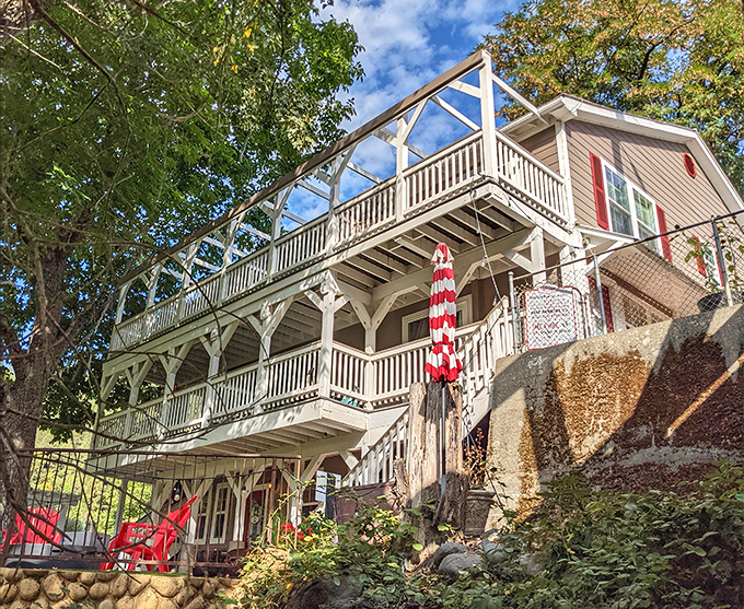 The Carriage House Inn's multi-tiered porches invite you to sit, sip something refreshing, and remember what relaxation felt like before smartphones existed.