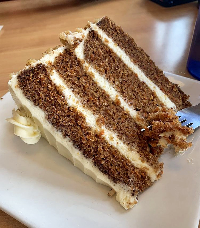 Layer upon layer of moist carrot cake separated by cream cheese frosting&mdash;architectural perfection that would make Frank Gehry put down his blueprints and pick up a fork.