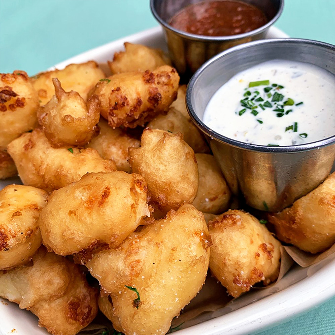 These cheese curds aren't just fried&mdash;they're transformed into golden pillows of Wisconsin pride that squeak with every heavenly bite.
