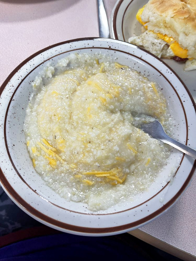 Cheese grits looking like Southern comfort food's answer to a warm hug on a cold morning.