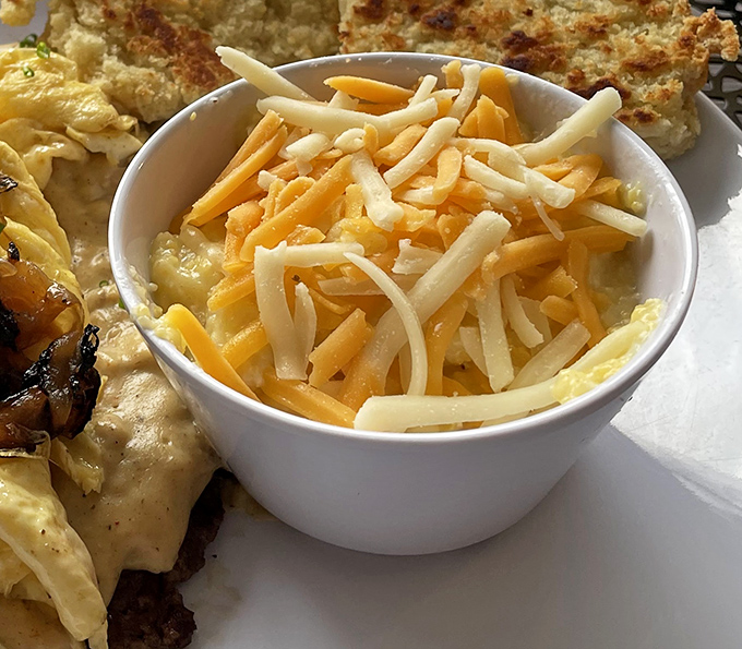 A bowl of cheese grits that would make any Southern grandmother nod in approval &ndash; comfort food that transcends regional boundaries.