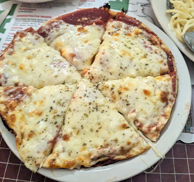 The cheese pizza at Inky's proves that sometimes the simplest things&mdash;perfect crust, bright sauce, melty cheese&mdash;create the most profound pleasures.