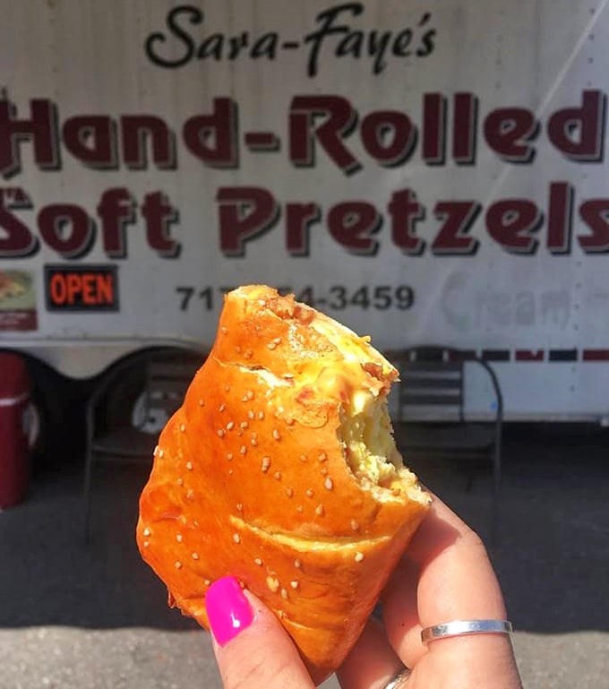 That moment when you spot "Sara-Faye's" in the background but your eyes can't leave the cheese-filled pretzel. Priorities, people.