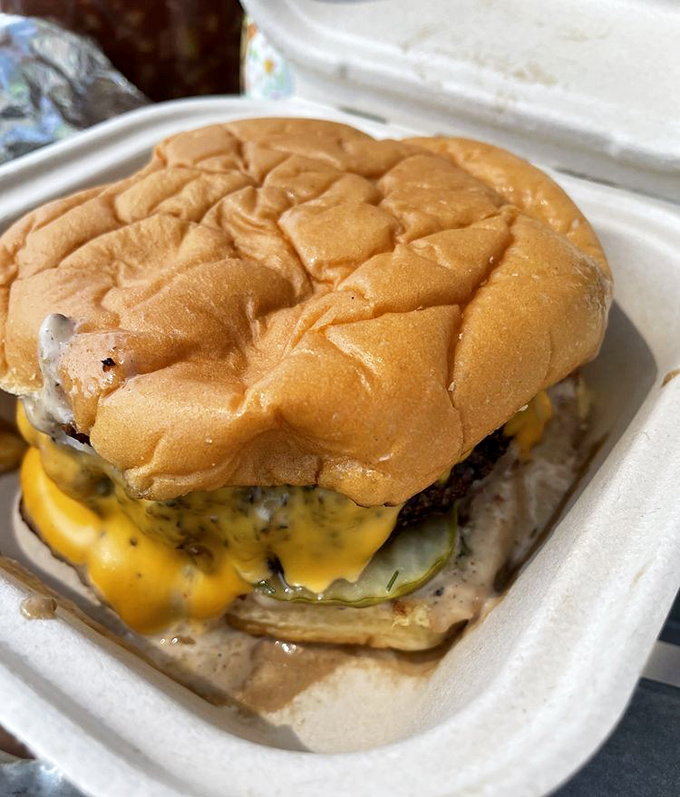 This isn't just a burger; it's a brisket-infused revelation topped with melty cheese that's causing serious commitment issues with my regular burger joint.