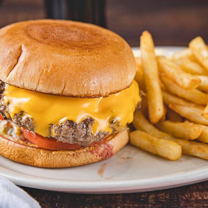 This isn't just a cheeseburger&mdash;it's a testament to simplicity done right, with melted American cheese hugging that beef patty like it never wants to let go.