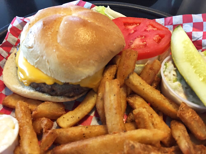The cheeseburger arrives like a work of art&mdash;golden bun, melted cheese, fresh toppings, and those seasoned fries that somehow disappear faster than you intended.