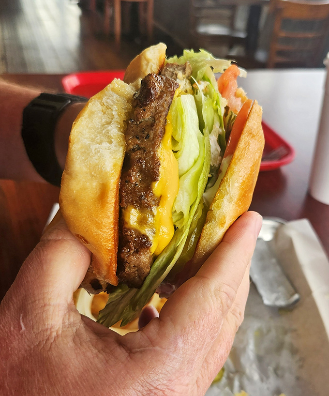 Not just a burger&mdash;a statement. When cheese, meat, and fresh veggies come together like this, conversation stops and appreciation begins.