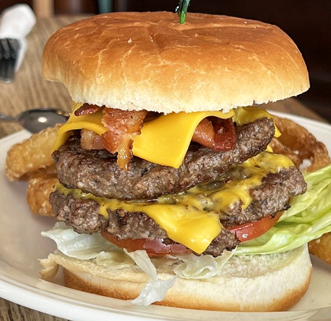 This isn't just a burger&mdash;it's a towering monument to beef that makes you wonder if your jaw will unhinge like a python's.