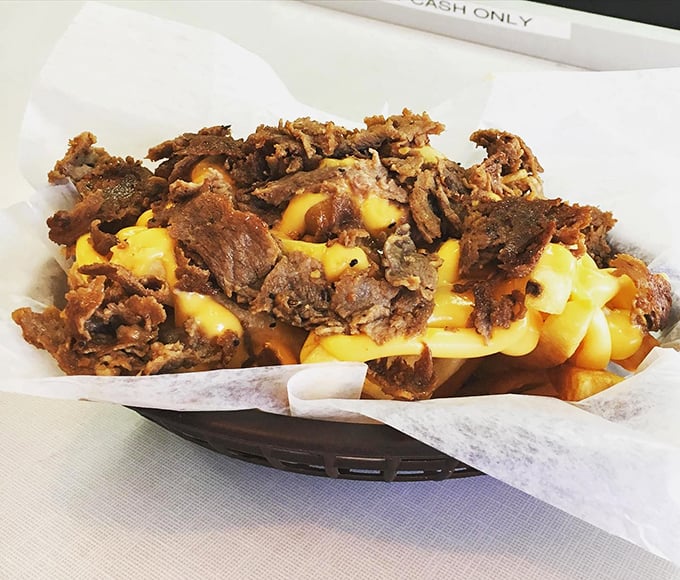 Not just a cheesesteak, but a masterclass in the art of meat-and-cheese architecture, where every bite delivers the perfect structural integrity of flavor.