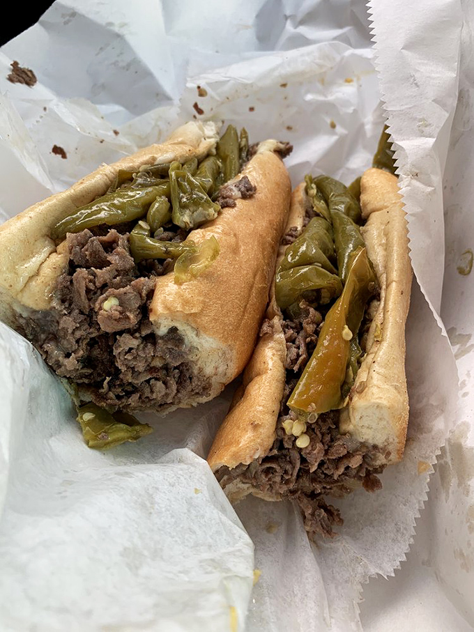 A pickle battalion stands guard over thinly-sliced turkey, creating that perfect acid-to-meat ratio that sandwich scholars have debated for generations.