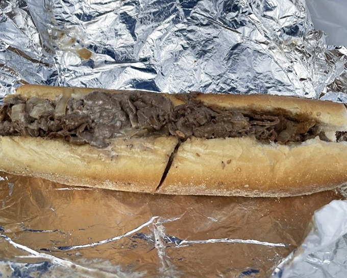 This cheesesteak hoagie isn't just a sandwich; it's a Philadelphia philosophy on bread&mdash;substantial, unpretentious, and worth every napkin you'll need afterward.