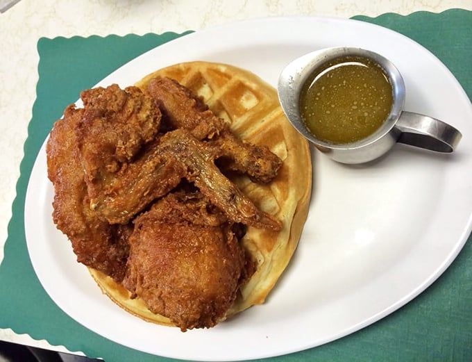 The chicken and waffle plate&mdash;where sweet meets savory in a dance as old as time, with maple syrup playing matchmaker.