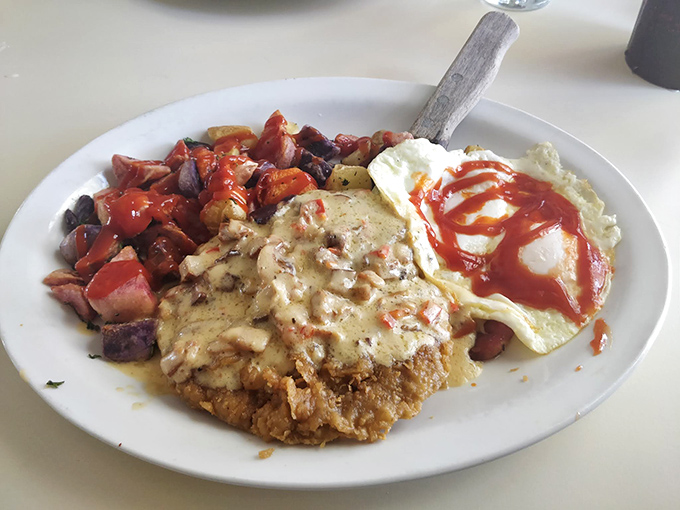 Country-fried steak smothered in gravy with a side of potatoes that didn't just fall off the truck&mdash;they were lovingly prepared for your comfort.