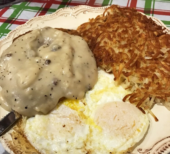 Crispy hash browns, savory sausage, and eggs smothered in country gravy – the breakfast equivalent of a warm hug.