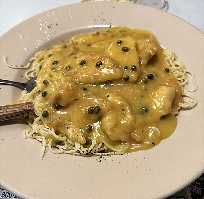 Chicken piccata that proves diners can do Italian classics justice—those capers adding tiny flavor bombs to each forkful of lemony goodness.