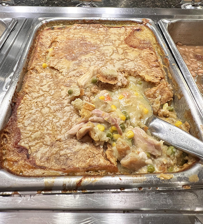 Beneath that golden crust lies a chicken pot pie that whispers, "Don't worry about that diet today&mdash;we have important comfort food business to attend to."