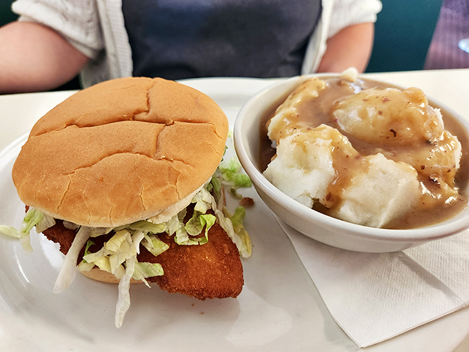 The chicken sandwich and mashed potatoes combo: proof that sometimes the simplest pleasures are the most satisfying. Gravy is not optional.