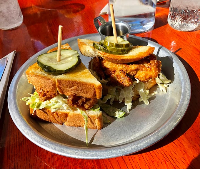 This sandwich isn't just lunch; it's an architectural marvel of crispy chicken, fresh vegetables, and bread that knows its supporting role.