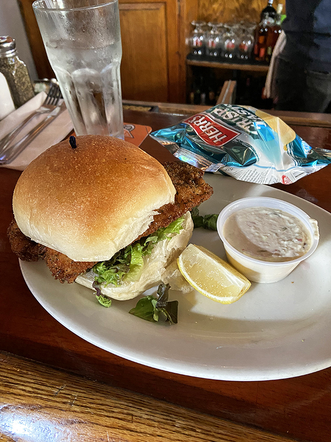 This sandwich isn't just lunch &ndash; it's edible architecture, with crispy chicken, fresh veggies, and a bun that's somehow both sturdy and cloud-soft.
