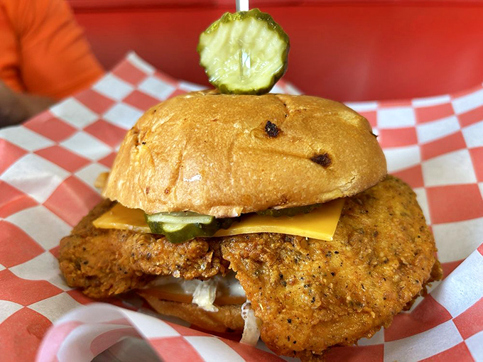 The perfect chicken sandwich doesn't exi&mdash; wait, there it is! Crispy chicken, melty cheese, and that pickle crown jewel bringing it all together.