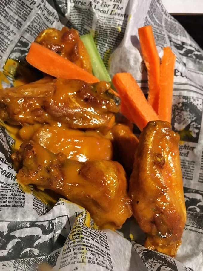 These wings aren't just sauced, they're dressed for success&mdash;glistening in tangy buffalo coating with crisp veggies standing by for relief.