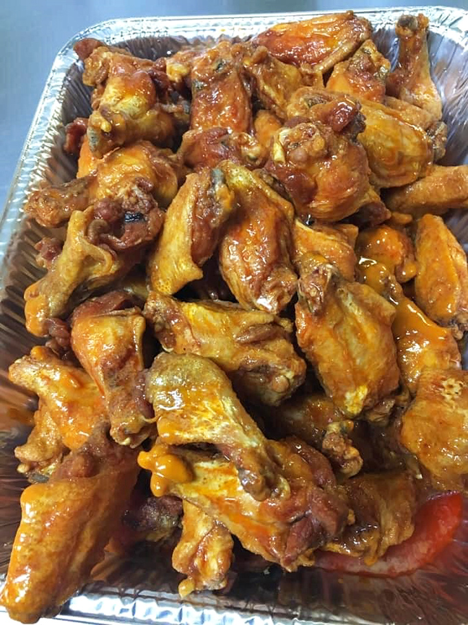 Chicken wings with that perfect balance of vinegary kick and buttery richness&mdash;these aren't merely wings, they're flavor vehicles designed for maximum satisfaction.