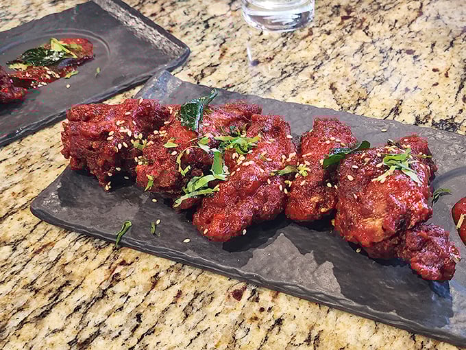 These aren't your average wings&mdash;they're dressed for a spice-forward flavor party. Glistening with sauce and garnished with fresh herbs, they're irresistibly photogenic too.