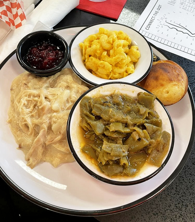 Southern comfort on a plate&mdash;chicken and dumplings, mac and cheese, and greens that have been simmering since your morning alarm went off.