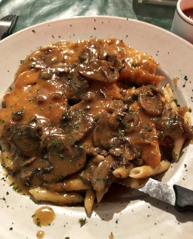 Chicken marsala that doesn't just sit on the pasta&mdash;it has a conversation with it. Those mushrooms aren't mere ingredients; they're flavor ambassadors in a rich, glossy sauce.