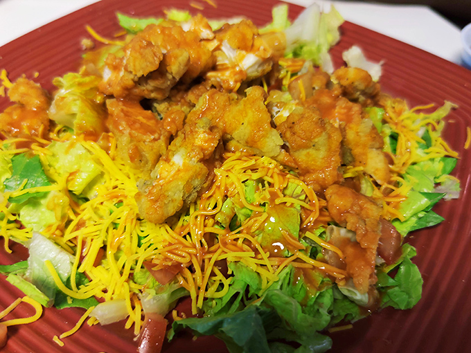 Even lunch gets the star treatment. This vibrant salad topped with crispy chicken proves the Zodiac's culinary gravitational pull extends beyond breakfast.